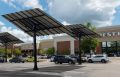 Solarizing parking lots with solar carports or elevated solar trackers
